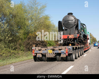 Locomotive steam train being transported by road 2015 Stock Photo - Alamy