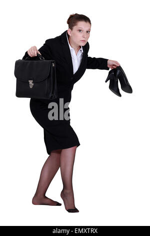 A businesswoman leaving quietly Stock Photo - Alamy