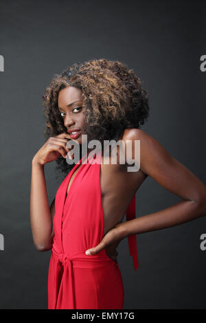 Glamorous african american woman in white turtleneck sweater pose at ...