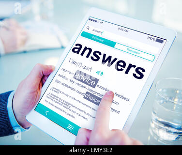 Man Reading the Definition of Answers Stock Photo - Alamy