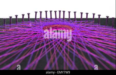 Display of colorful threads on a black panel Stock Photo - Alamy