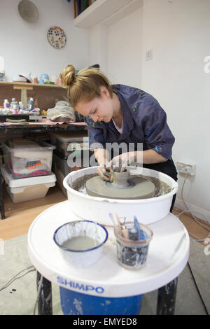 Women participating in a pottery class, art class, making ceramics ...