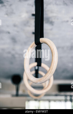 Closeup image of a fitness rings in gym Stock Photo - Alamy