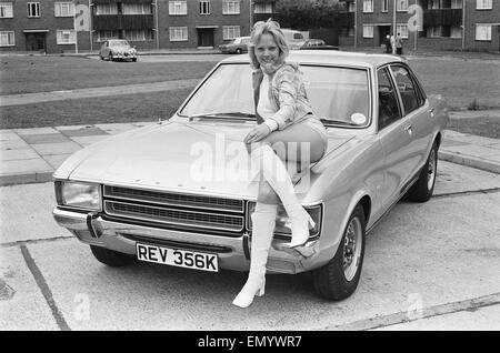 Reveille model Holly Davenport seen here posing with a Ford Consul ...