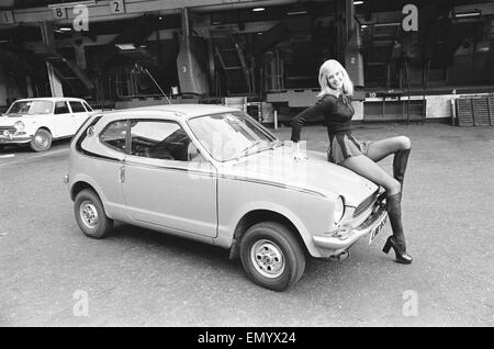 Reveille model Krista seen here posing with a Honda Civic car which is ...