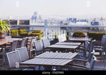rooftop cafe, open terrace with wooden tables Stock Photo - Alamy