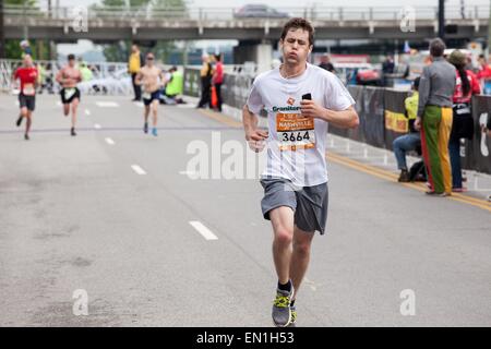 Nashville, Tennessee, USA. 25th Apr, 2015. Runner TODD MAXEY breathes a ...