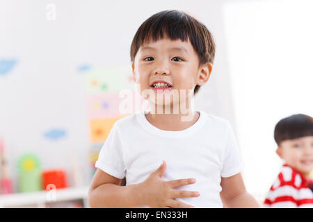 Chinese children boys in Kindergarten school in rural farm village town ...