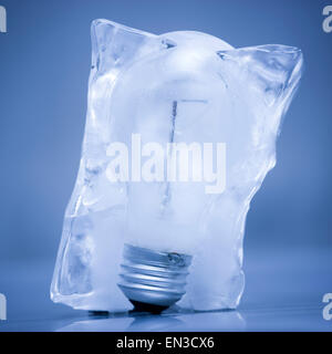light bulb frozen in a block of ice Stock Photo - Alamy