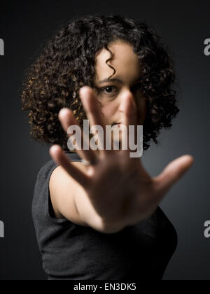Woman reaching hand toward camera Stock Photo - Alamy