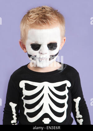 Boy in Halloween skeleton costume Stock Photo - Alamy