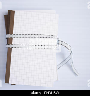 Two hardcover notebooks with ribbon Stock Photo - Alamy