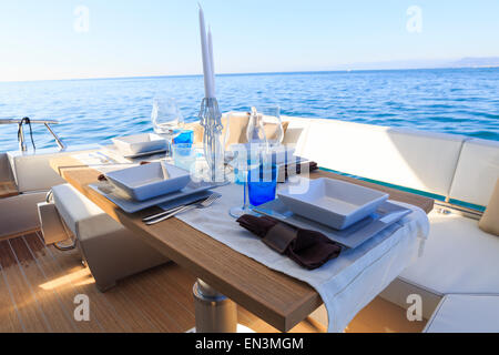 lunch on motor yacht, Table setting at a luxury yacht Stock Photo - Alamy