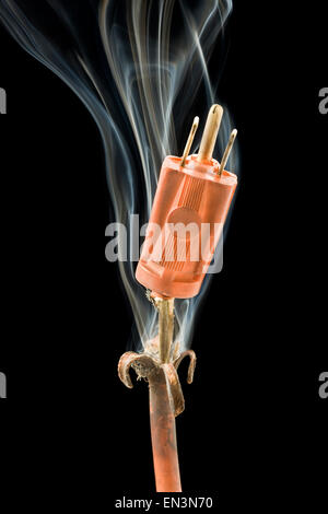 Vertical shot of an electrical extension cord isolated on black ...