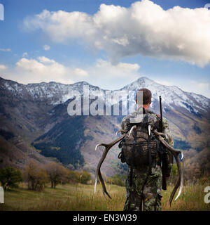 man hunting in the wilderness Stock Photo - Alamy