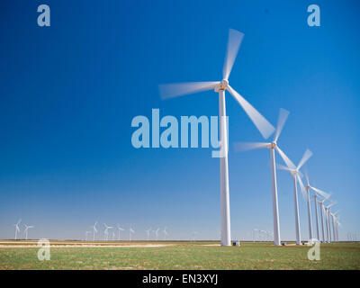 Image of earth day, wind turbines and date on blue background Stock ...