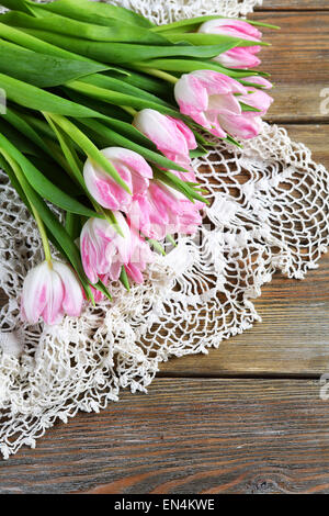 Tulips flowers bouquet of wooden boards as a background Stock Photo - Alamy