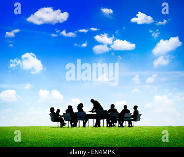 Business People Discussing Around The Conference Table And A Blue ...