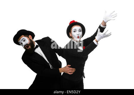 mime holding another one up and running Stock Photo - Alamy