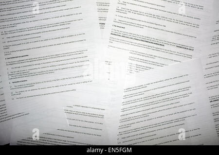 The small print visible on a selection of papers Stock Photo - Alamy