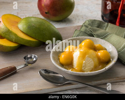 Mango jubilee flambe Stock Photo - Alamy