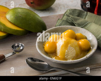 Mango jubilee flambe Stock Photo - Alamy