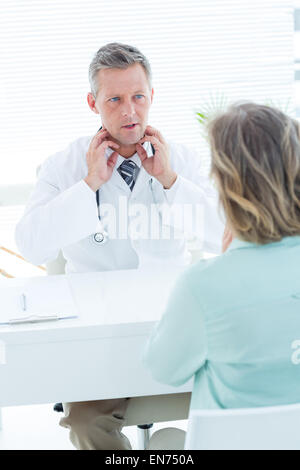 Doctor having conversation with patient while discussing explaining ...