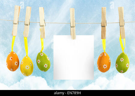 Composite image of hanging easter eggs Stock Photo - Alamy