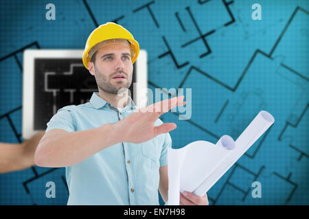 Composite image of architect with blueprint gesturing on white ...