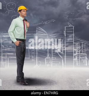 Full length profile shot of an engineer carrying blueprints and walking ...