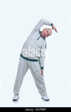 The old man doing exercises indoors Stock Photo - Alamy