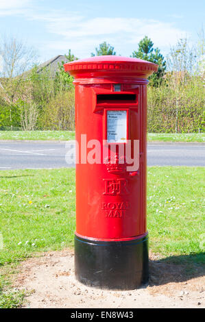 Closeup of Victorian red Royal Mail pillar box post box on High Street ...
