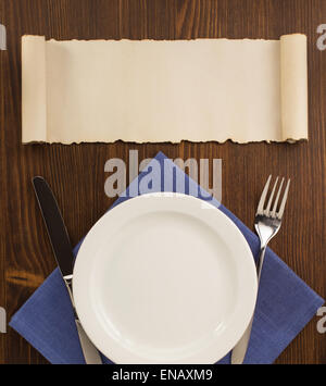 kitchen utensils and cloth napkin on wooden background Stock Photo - Alamy