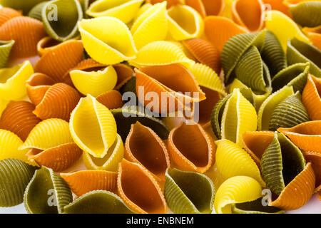 Multicolor shell pasta with tomato and spinach Stock Photo - Alamy