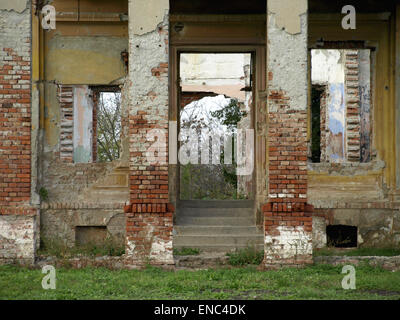 Demolished and destroyed the abandoned castle Stock Photo - Alamy