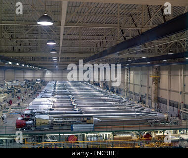 A photograph showing an overall view of the Atlas missile assembly line ...