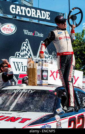 Joey Logano celebrates in victory lane after winning a NASCAR Cup ...