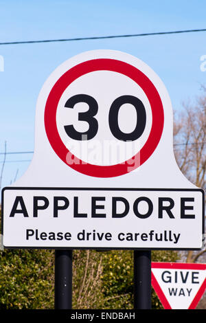 Sign for the village of Appledore, Kent, United Kingdom in a hedge ...