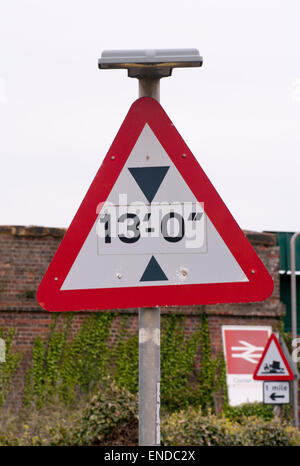 british road sign warning of height restriction, at a rail bridge in ...