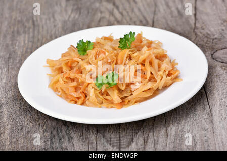 Portion of stewed cabbage on table Stock Photo - Alamy