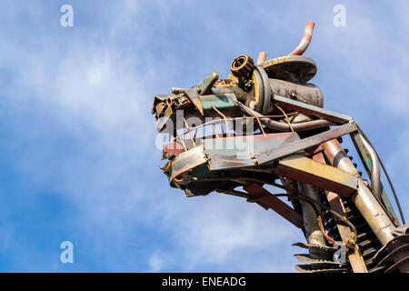 Assorted junk metal welded together to form a cow head in black and ...