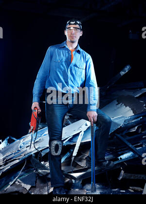 Young man contractor doing renovation at home Stock Photo - Alamy