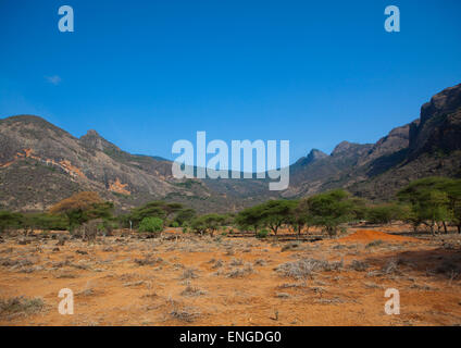 Kenya, Samburu district, Ndoto Mountains. Sheer rock faces of the ...