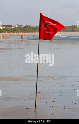 Red flag in Kuta on the beach, Bali, Indonesia Stock Photo - Alamy