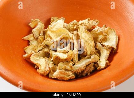 Dried thinly sliced ginger root Stock Photo - Alamy