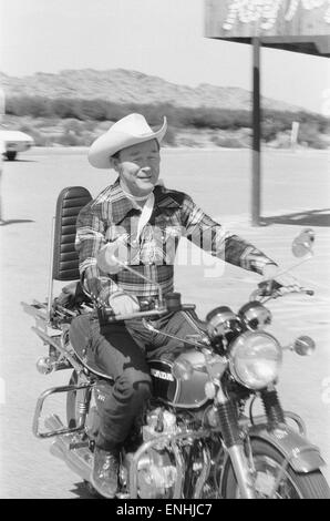 Actor Roy Rogers known as the singing cowboy seen here on a Honda ...