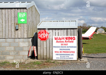 Airfield warning sign Stock Photo - Alamy