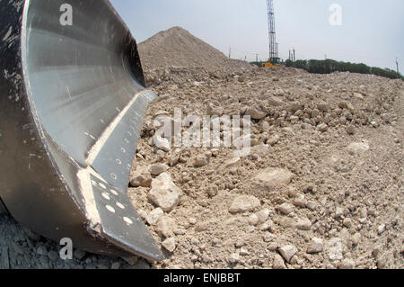 loading machine produces crushed stone for a career Stock Photo - Alamy