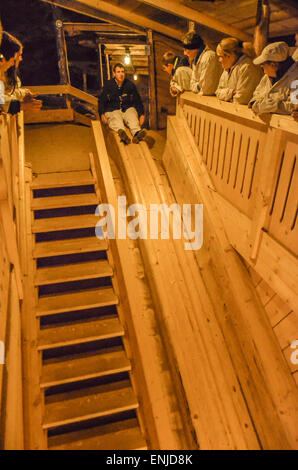Sliding down into the heart of the salt mine on two miners’ slides is ...