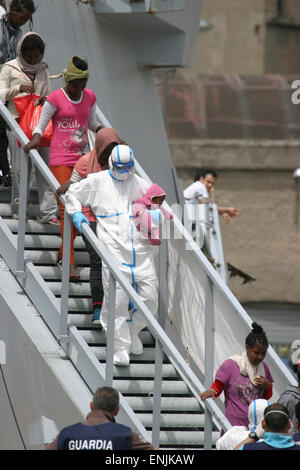 Naples, Italy. 06th May, 2015. Immigrants arrive at the port of Naples ...
